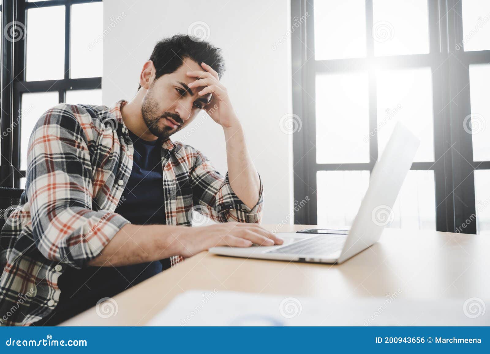 Iranian Young Man Seriously Working on Computer Laptop Stock Photo ...