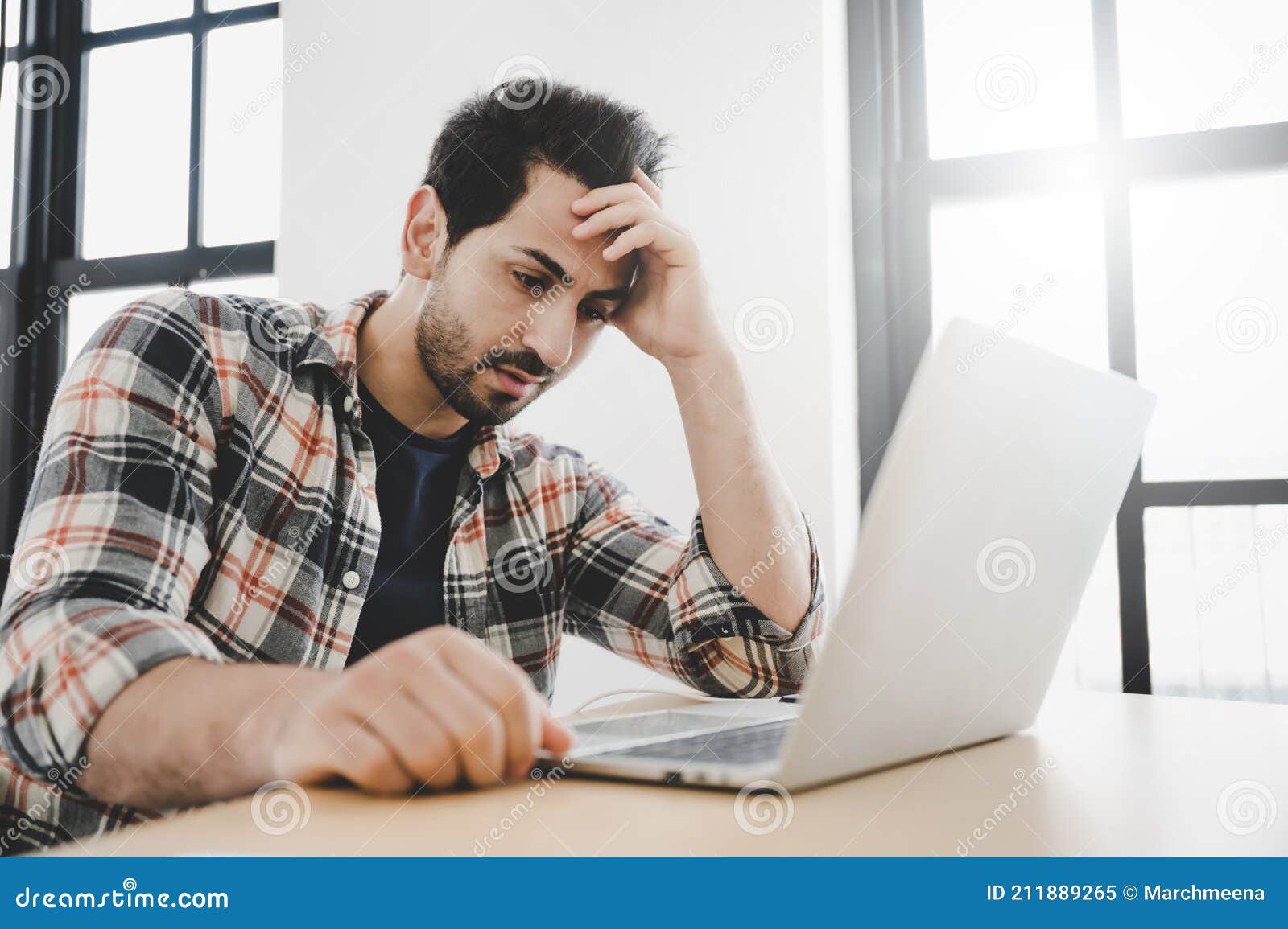 Iranian Young Man Seriously Working on Computer Laptop Stock Image ...