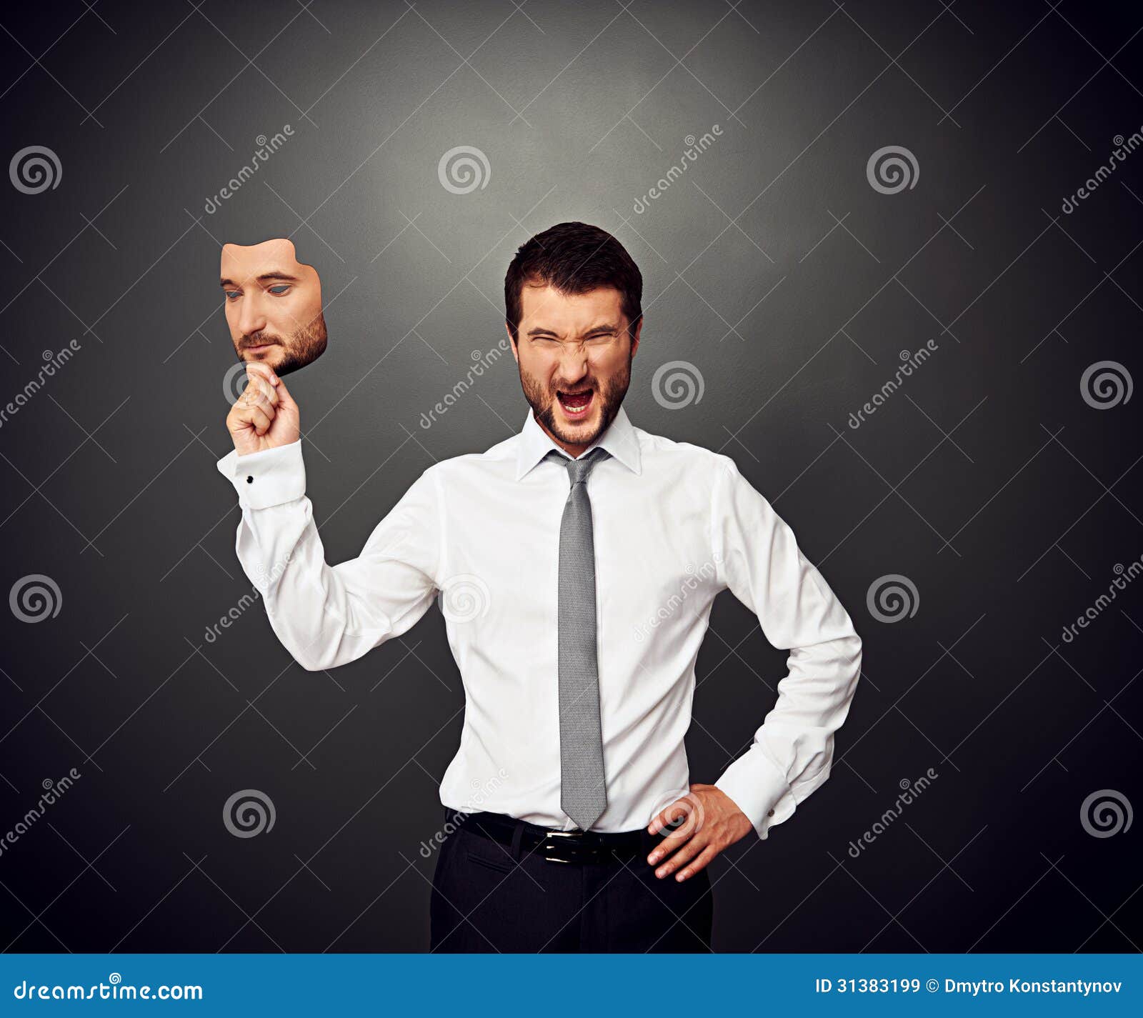 Irate man holding mask stock image. Image of dissimulation - 31383199