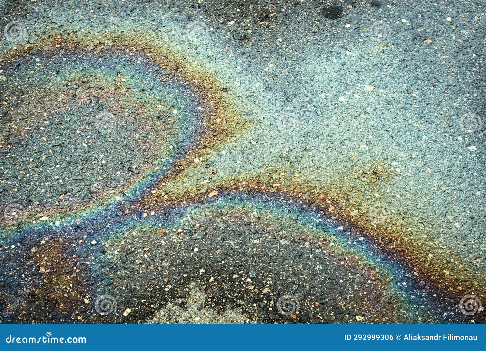 Iridescent Spot Of Gasoline. Petrol On The Asphalt A Big Polluted ...