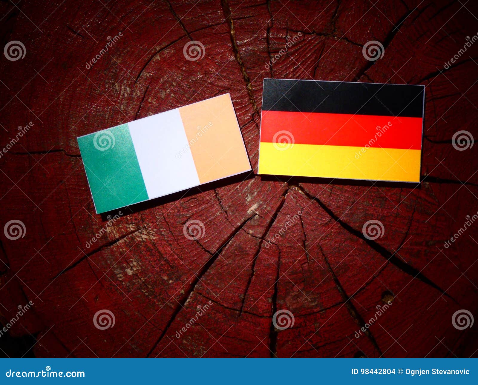 Irish Flag with German Flag on a Tree Stump Stock Photo - Image of ...
