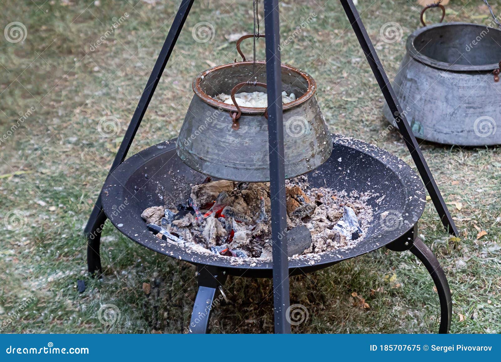 Iron Big Pot Hanging Over a Fire, Cooking Soup on a Hike Stock Image ...
