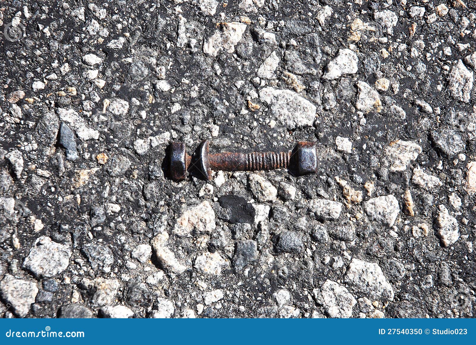 Iron Bolt and Nut in the Asphalt Texture Stock Photo - Image of roadway ...