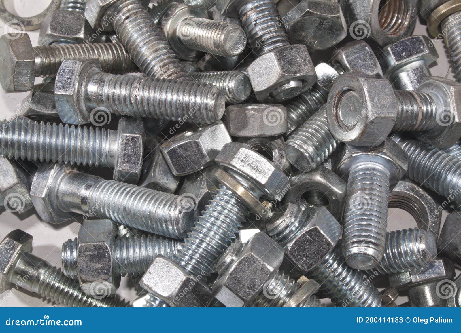 Iron bolts as a background stock image. Image of tool - 200414183