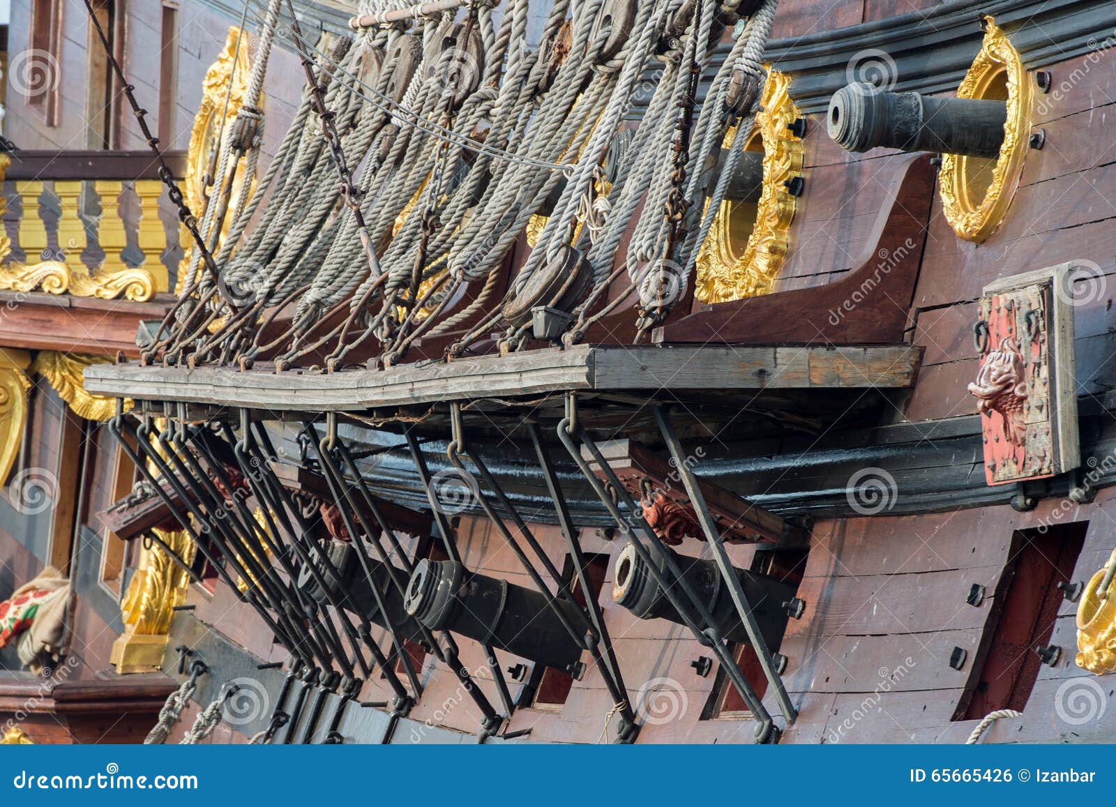 Iron cannon on sail ship stock photo. Image of frigate - 65665426