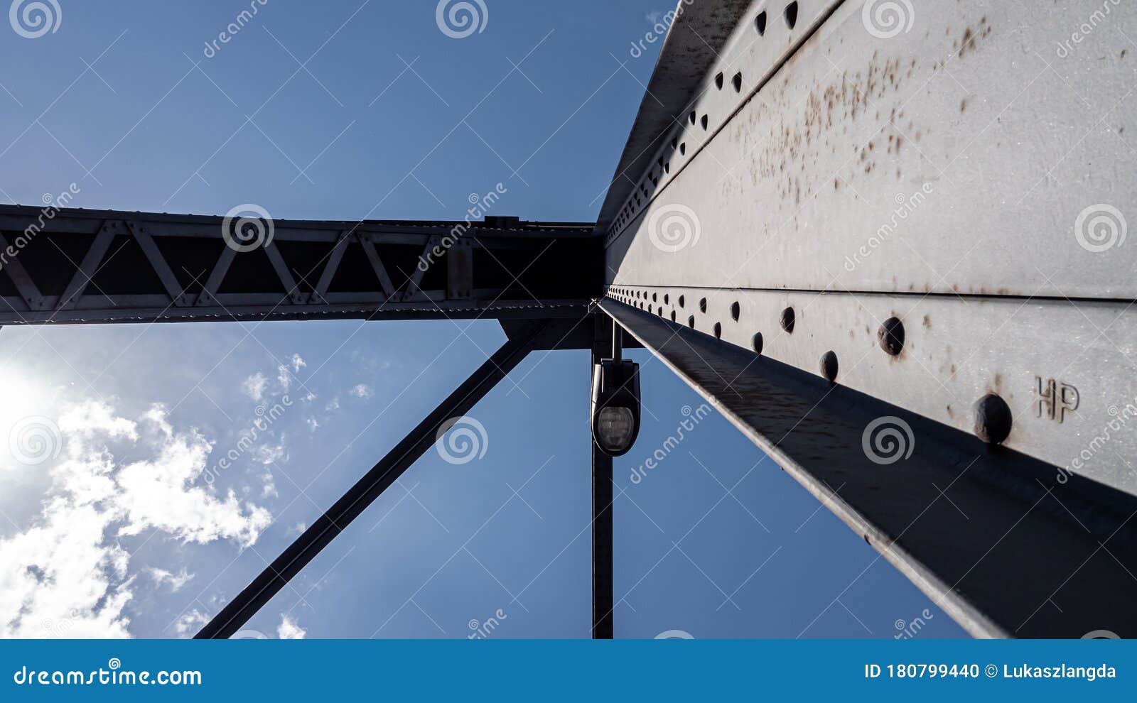 Iron Construction of the Bridge Against the Blue Sky Stock Photo ...