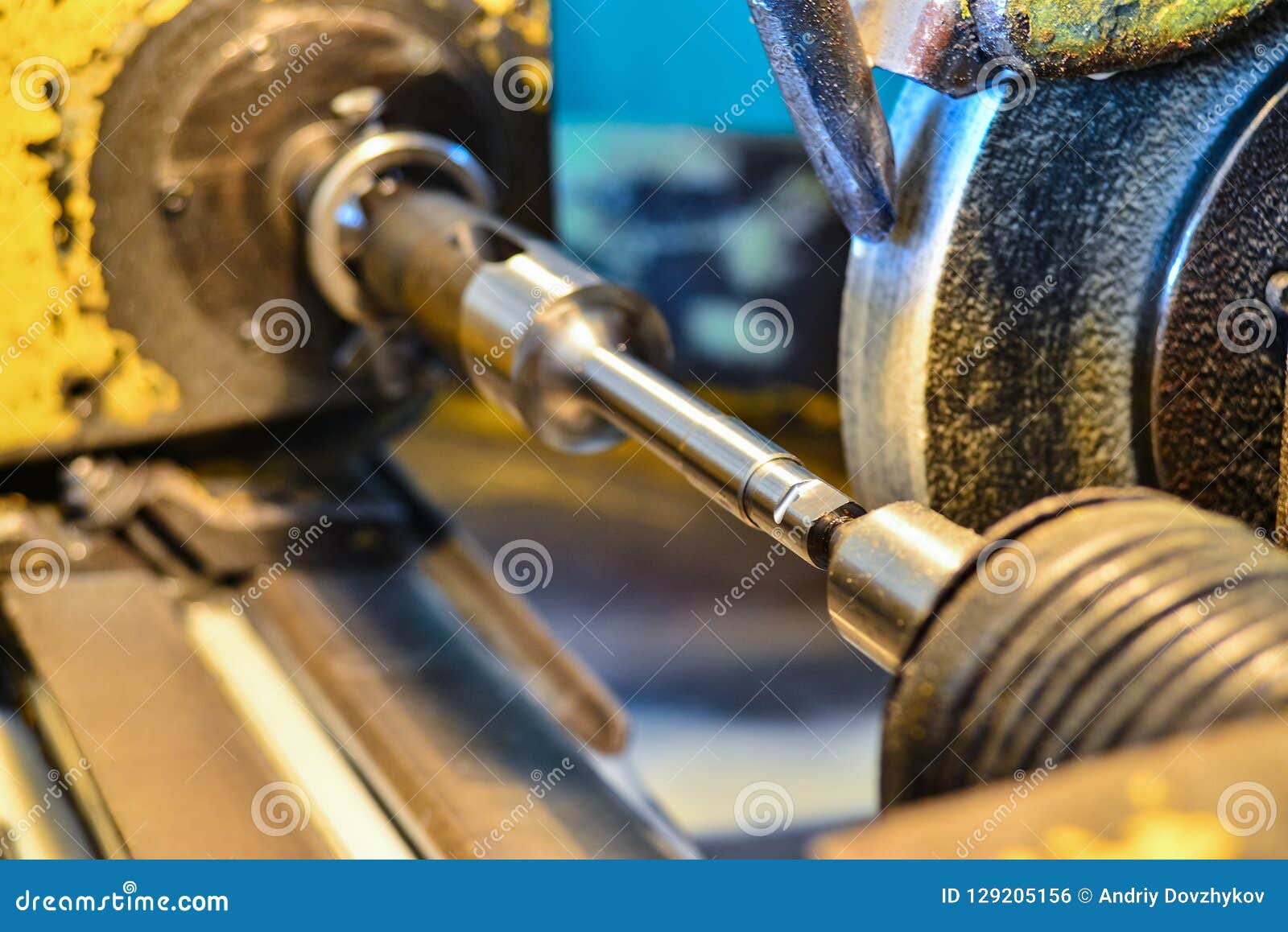 The Iron Cylindrical Part is Mounted on a Grinding Machine, Close-up ...