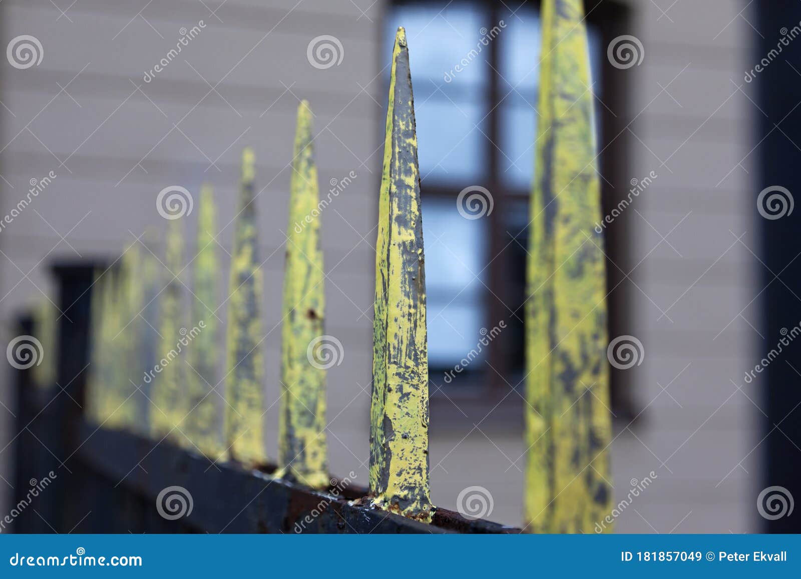 Iron Fence with Sharp Tips in Yellow, Protection for Military Area ...
