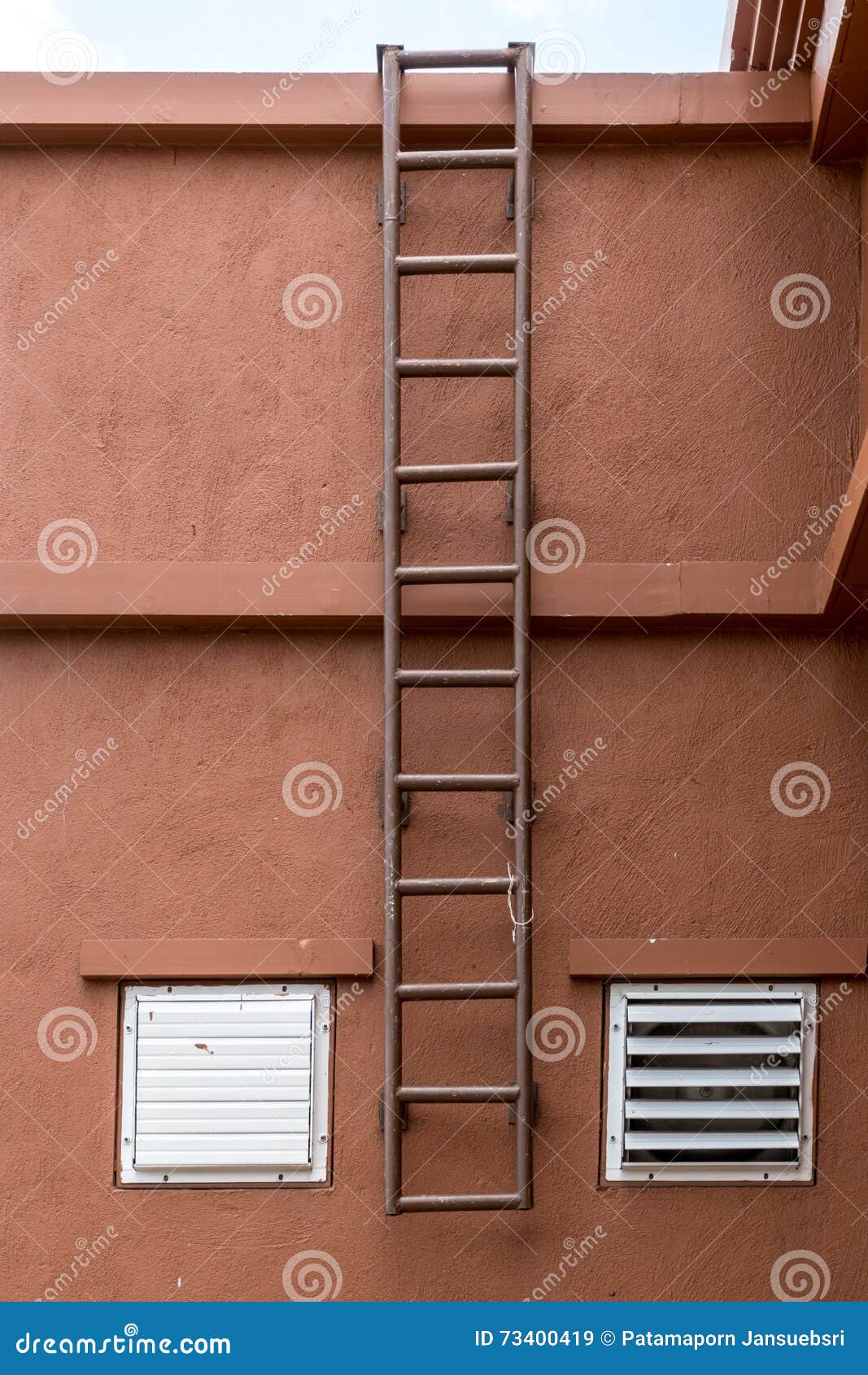Iron fixed ladder on wall stock image. Image of climb - 73400419