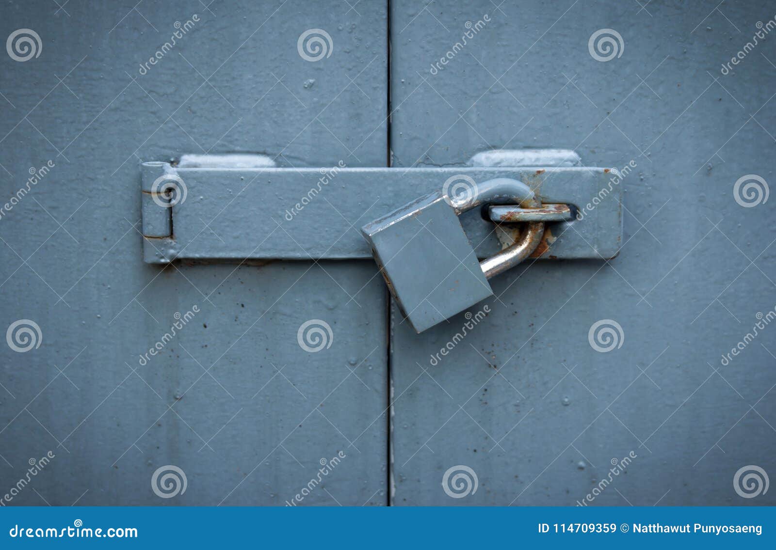Iron gate with lock stock image. Image of protect, gate - 114709359