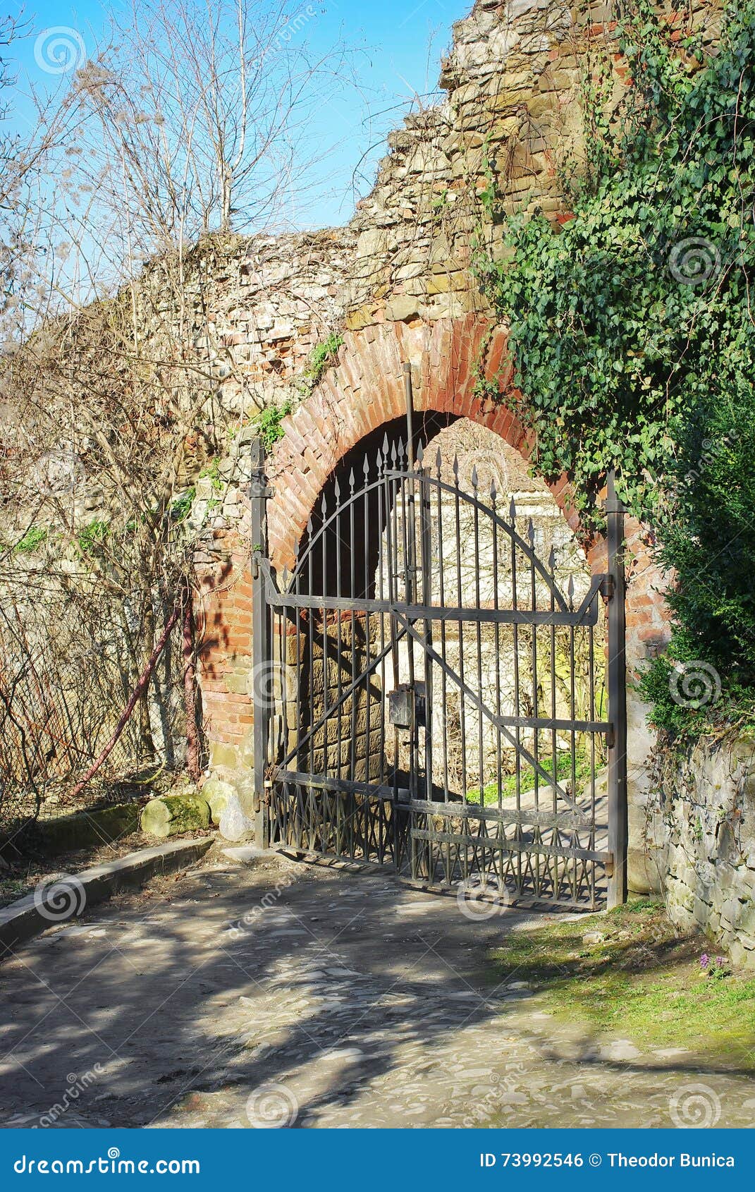 Old Iron gate. Ruined wall stock photo. Image of blue - 73992546