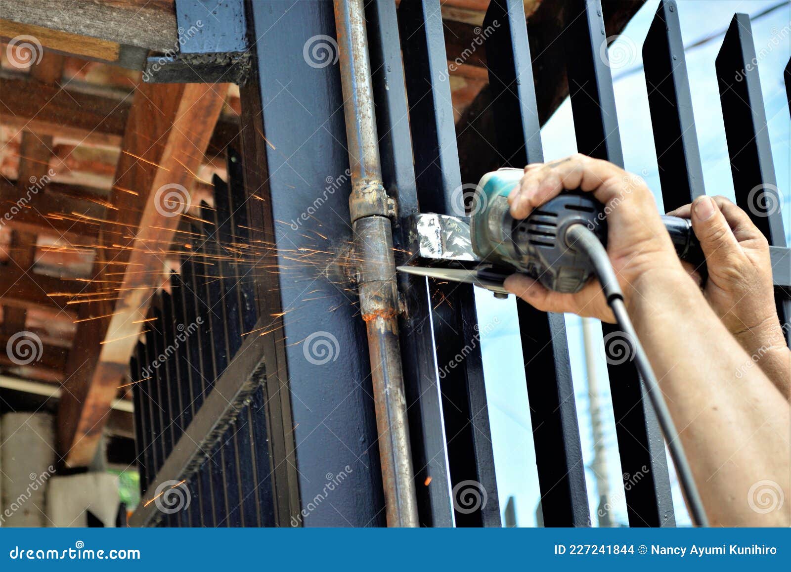 Passing the Grinder at the Iron Gate Stock Photo - Image of spark, fire ...