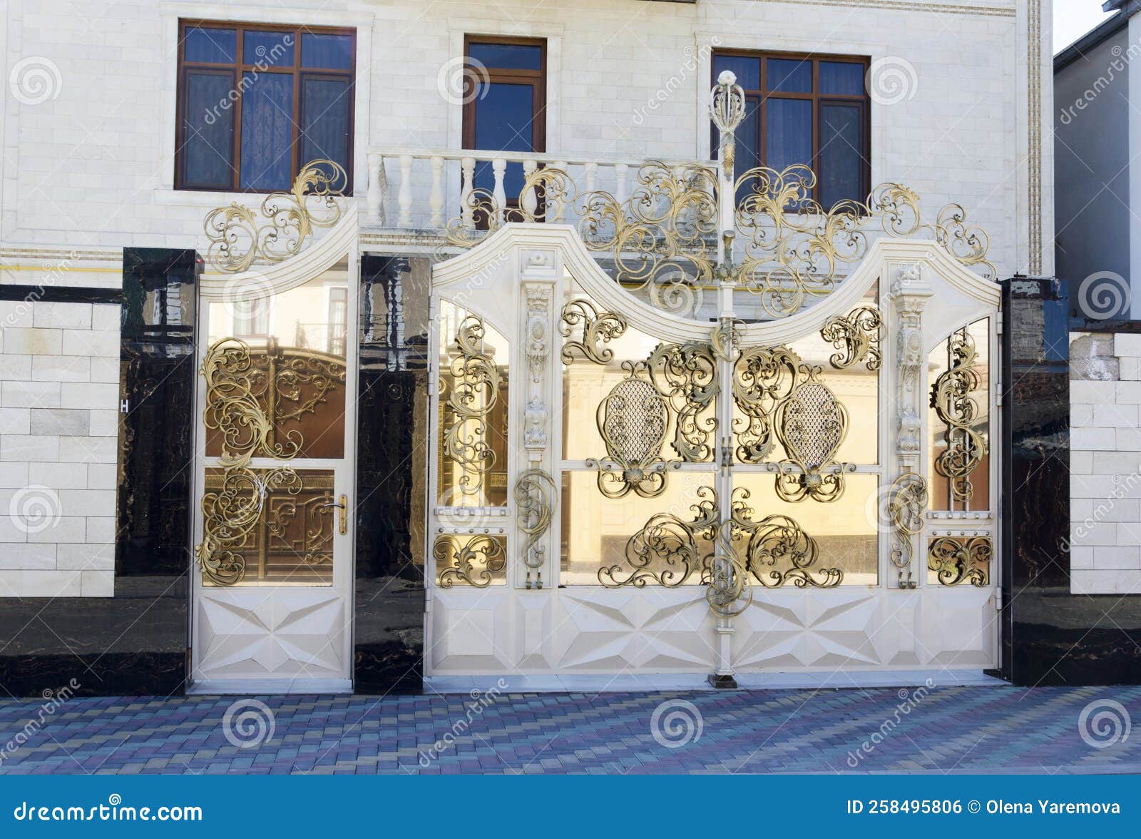 Iron gate with wicket stock photo. Image of house, exterior - 258495806