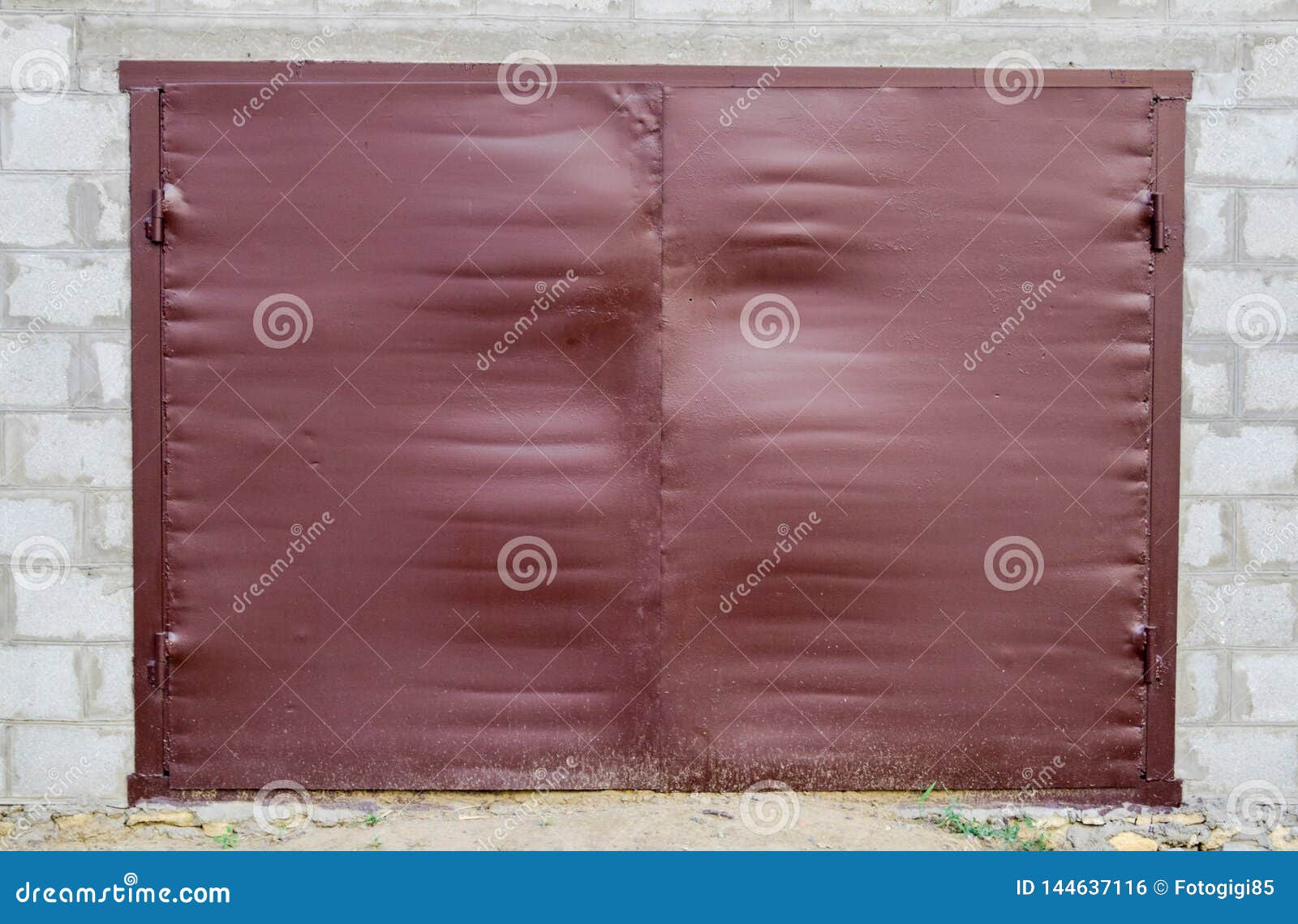 Iron Gates on the Garage. Brown Gates Made Stock Photo - Image of lock ...