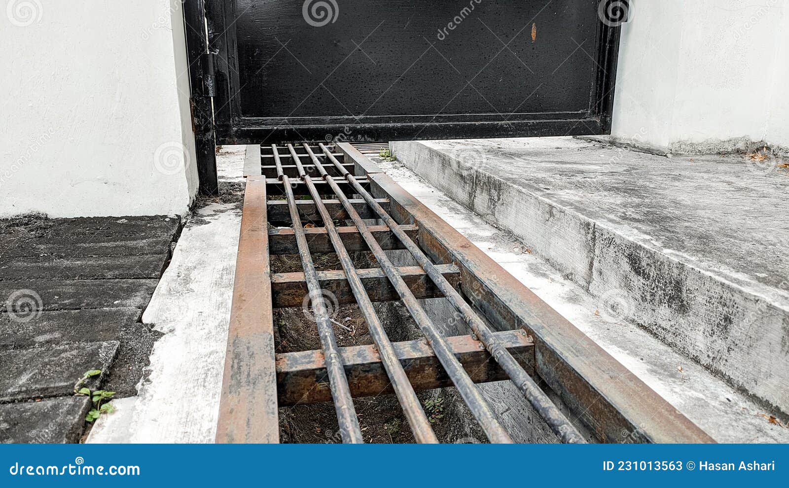 Iron Grate Drainage Channel on Pedestrian Path. Drains with Iron Bars ...