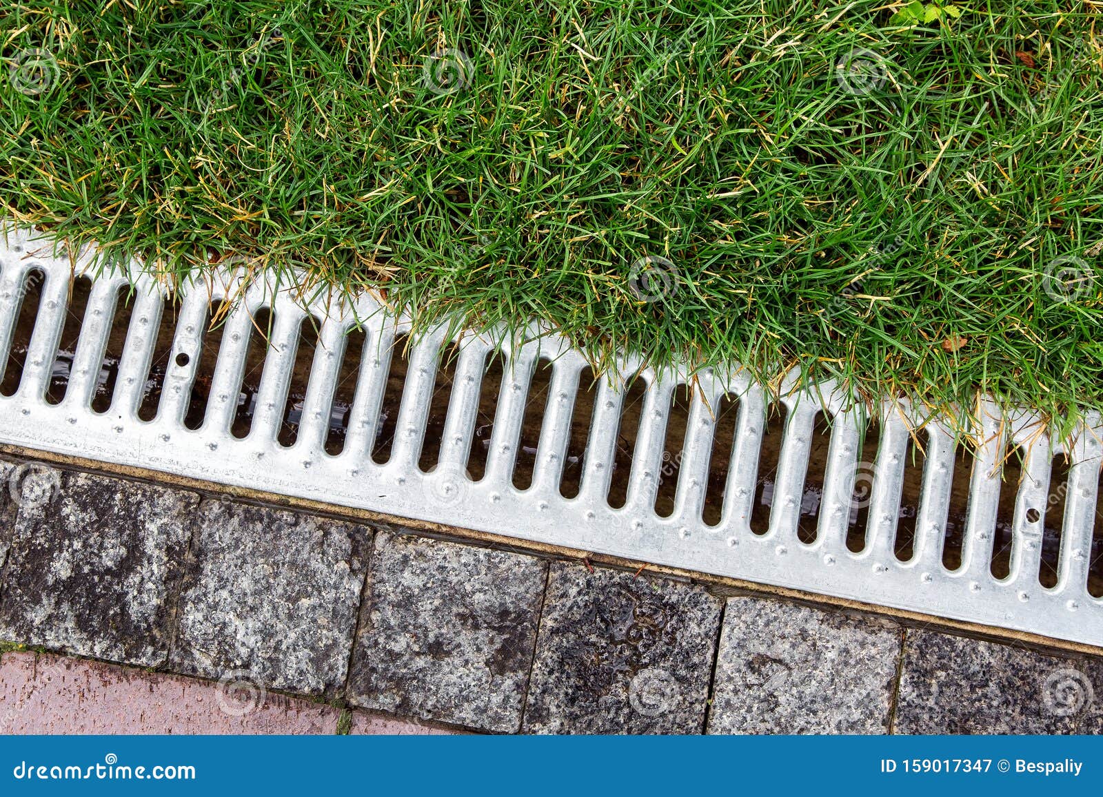 Iron Grate of a Storm Drainage System on the Side. Stock Image - Image ...