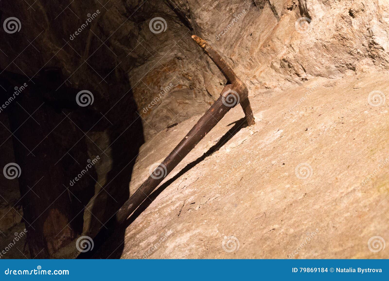 Iron hack in a stone cave stock photo. Image of iron - 79869184