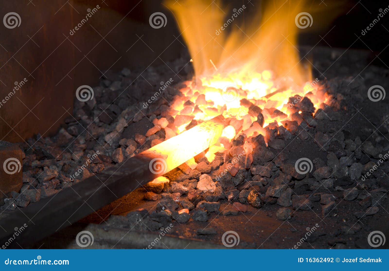 Iron in the hearth stock photo. Image of heat, work, hearth - 16362492