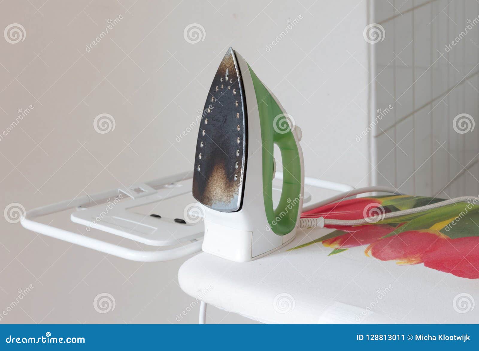 Iron on ironing board stock image. Image of lifestyle - 128813011