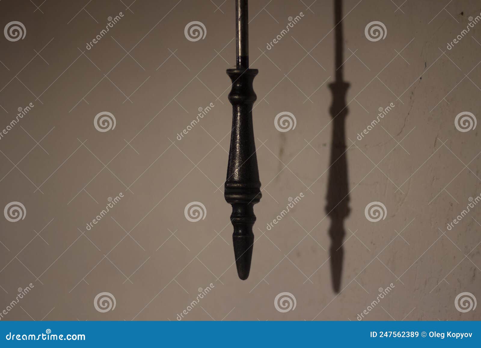 Shadow Of A Clock Mechanism With Roman Numerals On A Brick Wall Stock ...