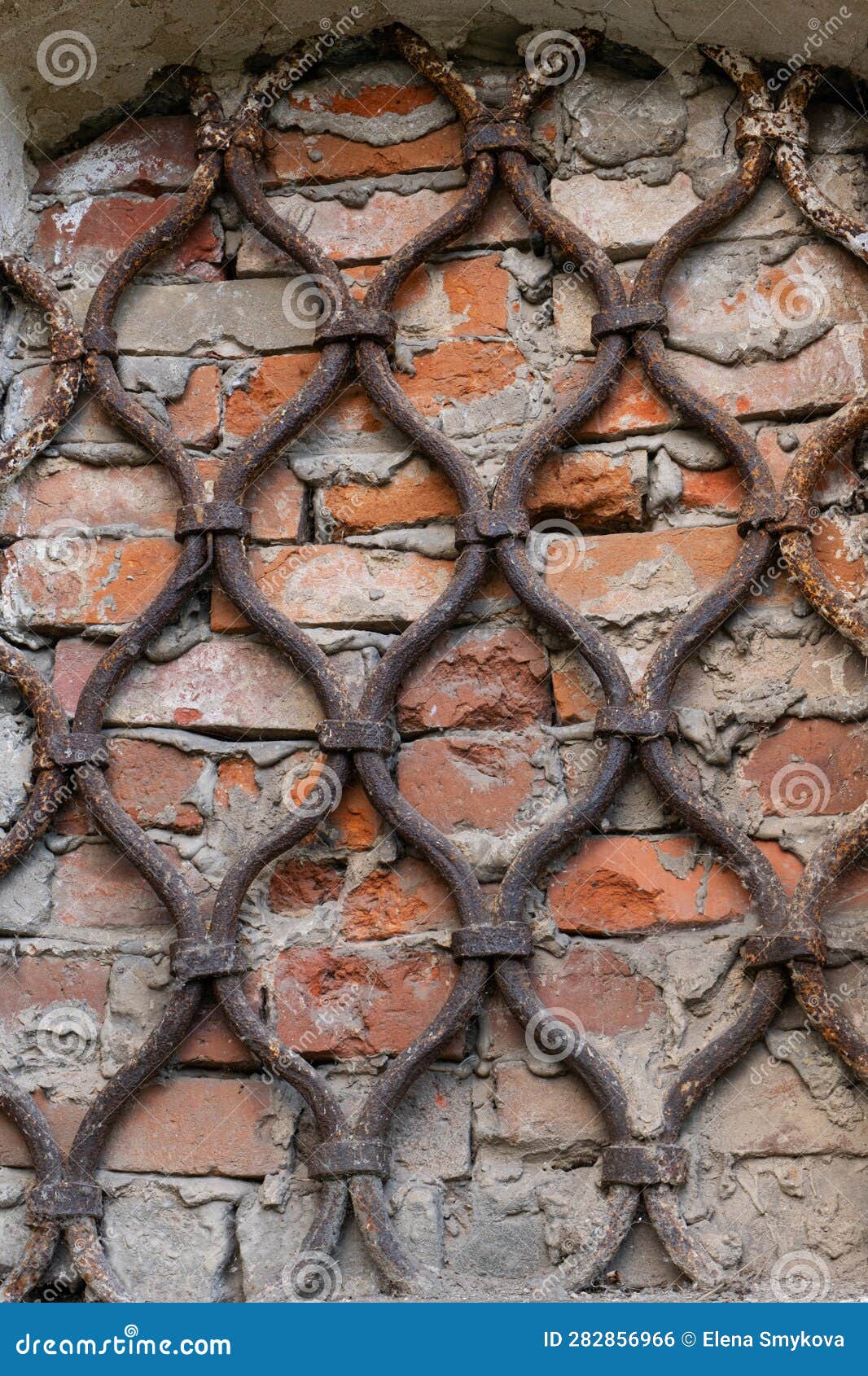 Iron Openwork Lattice on the Red Brick Wall Stock Photo - Image of ...