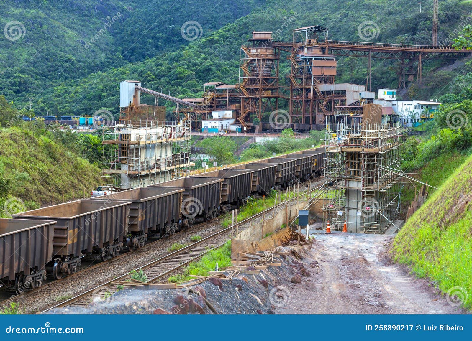 Train Loading Scrap Metal Piled Outside A Factory, Train Transporting ...