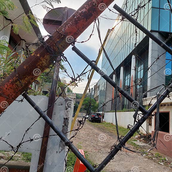 Iron Pole Entry Gate with Barbed Wire Installed Editorial Photo - Image ... Iron Pole Entry Gate with Barbed Wire Installed Editorial Photo - Image ...