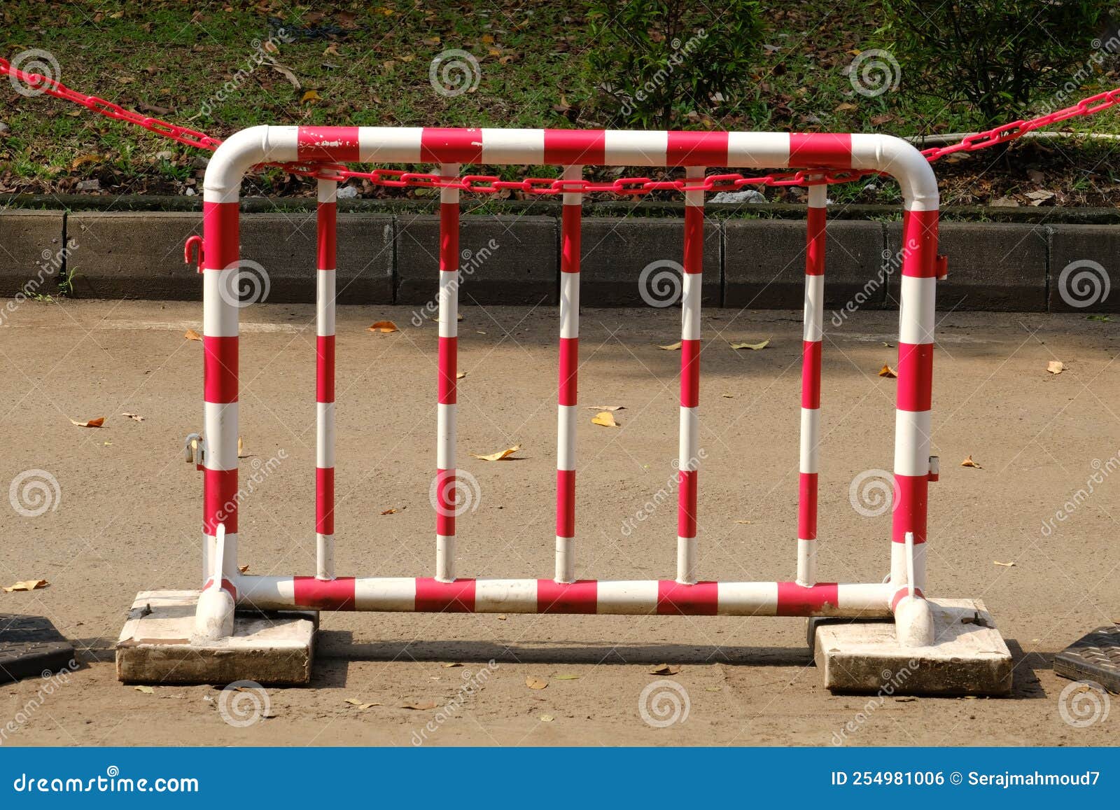 Iron Road Divider with Red and White Strips Stock Photo - Image of ...