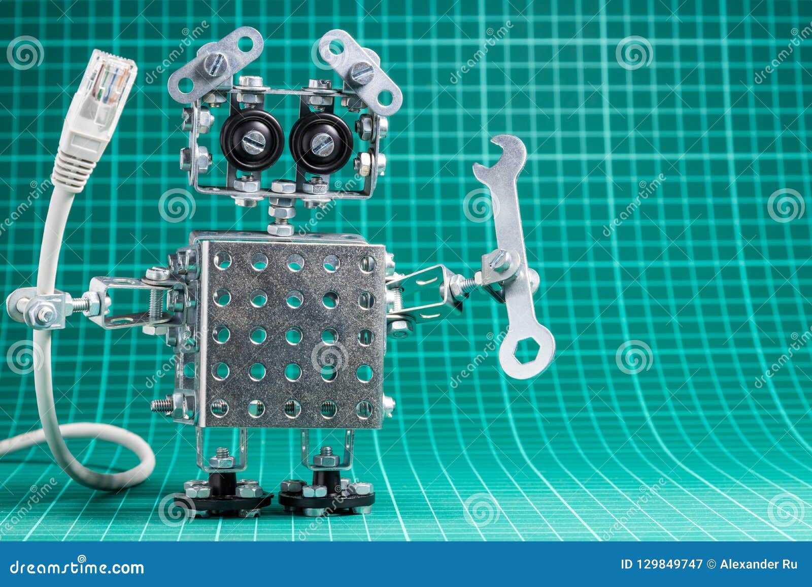 An Iron Robot Holds a Rj45 Cable and a Wrench. Stock Image - Image of ...