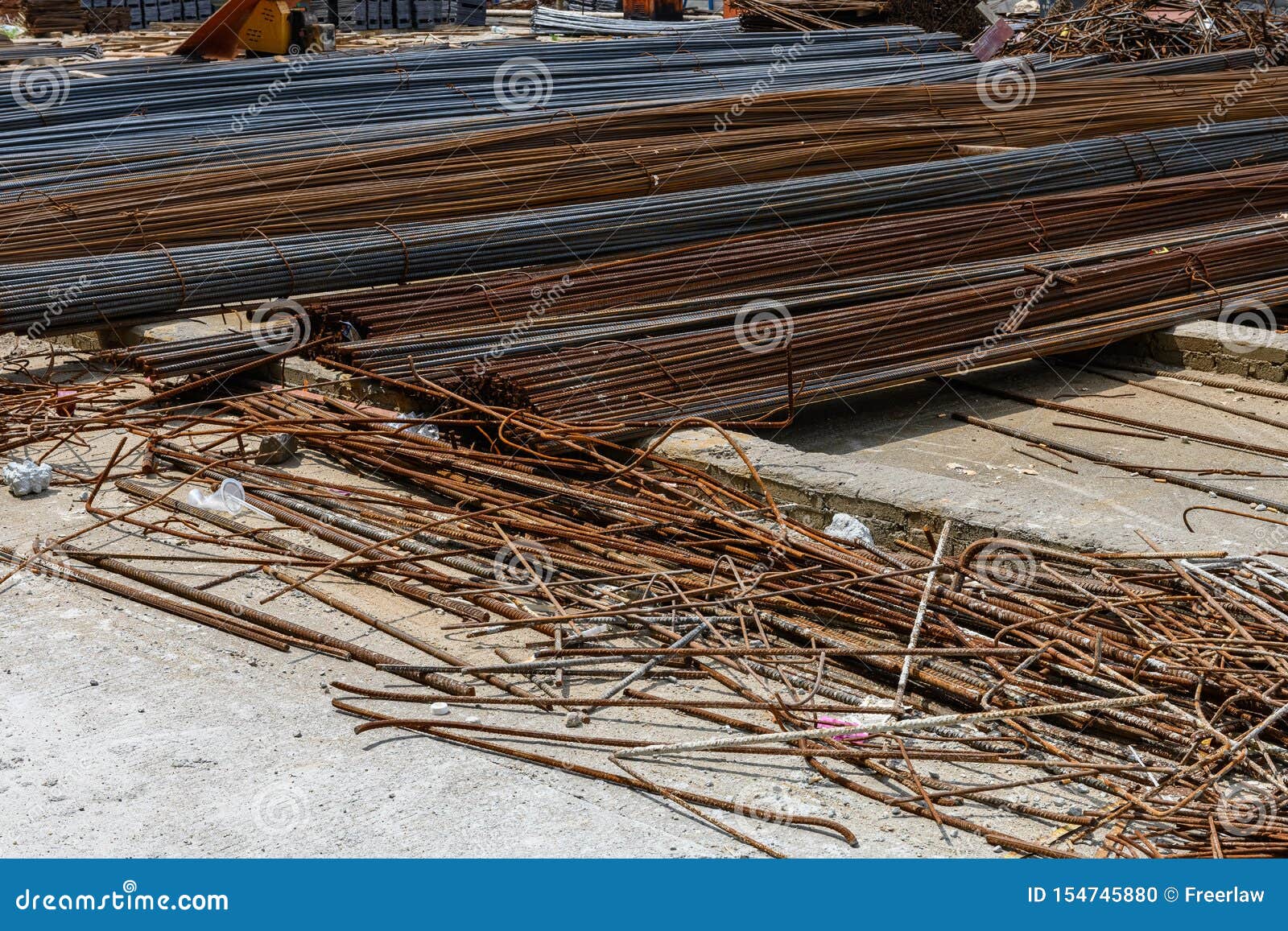 Iron rods on ground stock photo. Image of wire, industrial - 154745880