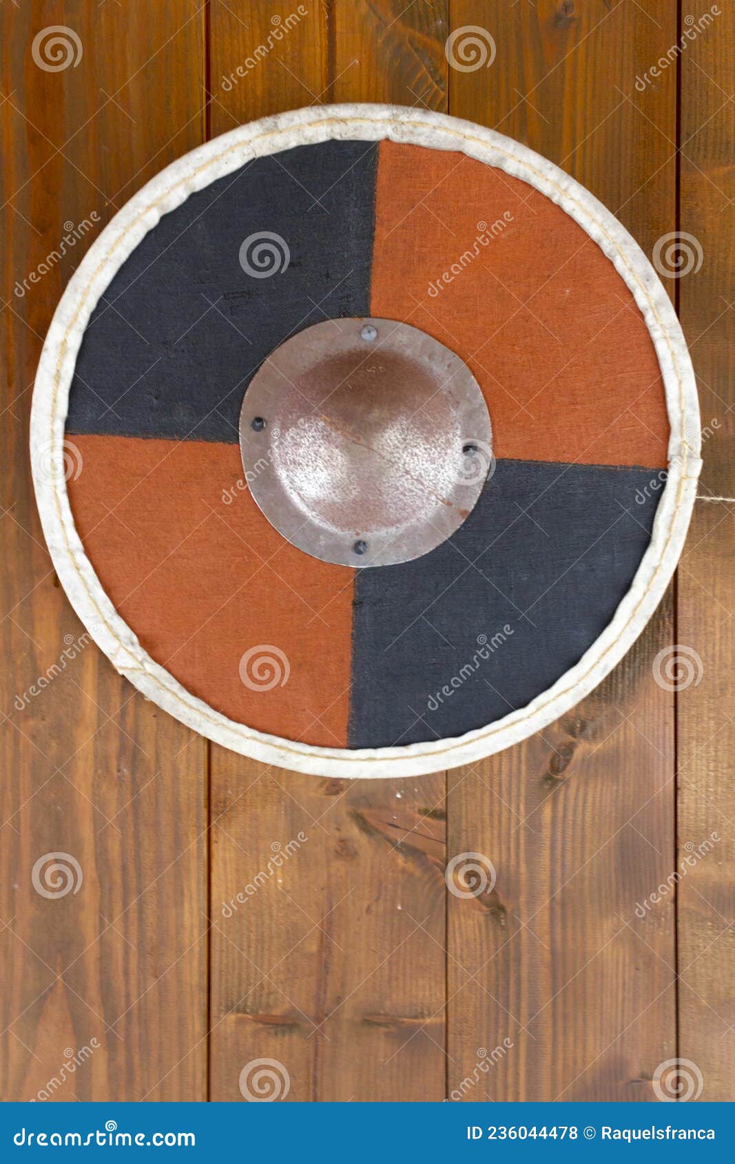 Iron shield on wooden wall stock photo. Image of medieval - 236044478