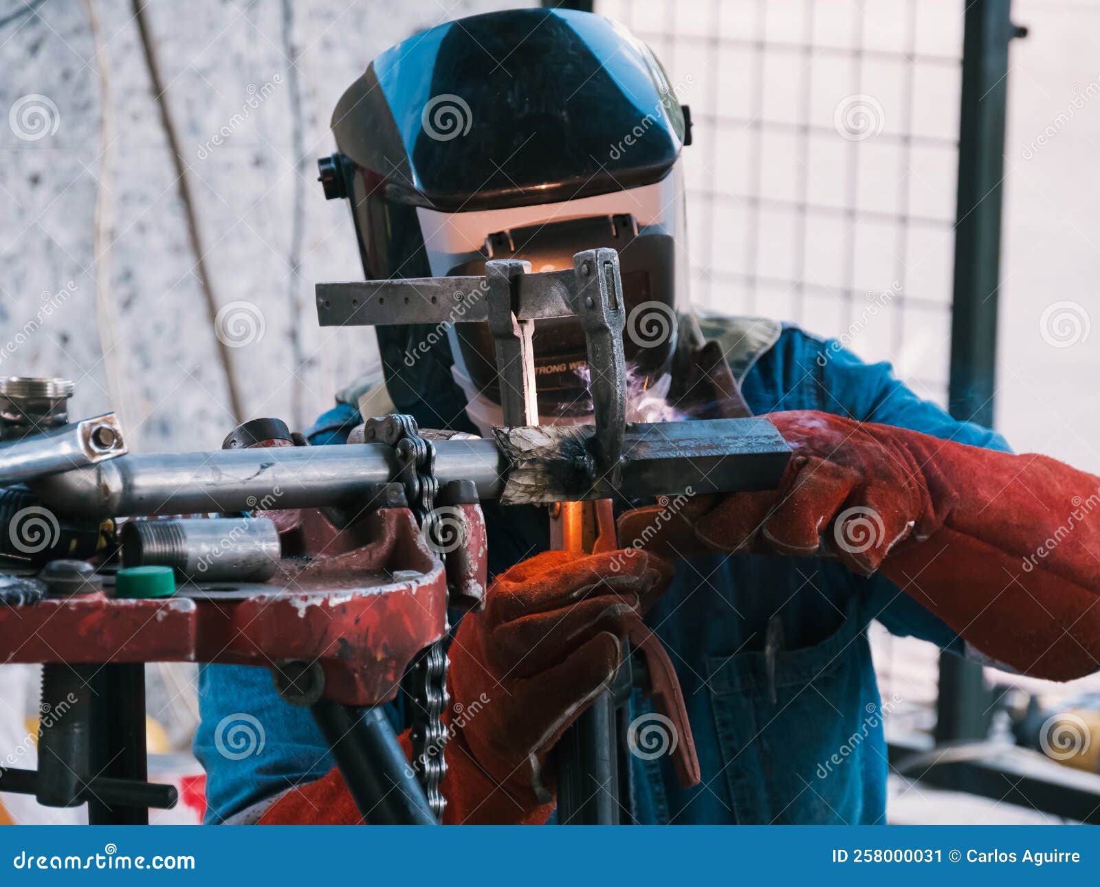 Iron Soldering, Man Working on Iron Soldering, Welding Sparks Stock ...