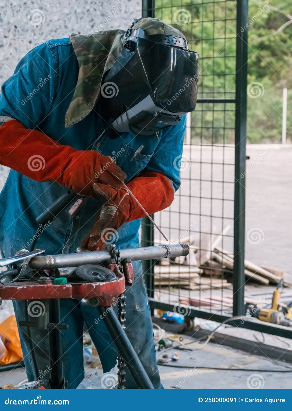 Iron Soldering, Man Working on Iron Soldering, Welding Sparks Stock ...