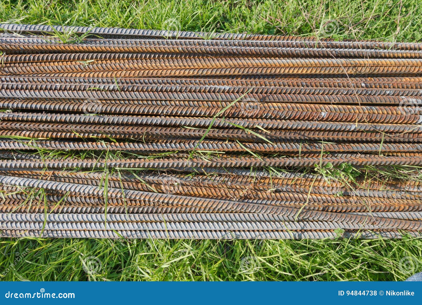 Iron stack on the grass. stock photo. Image of pile, site - 94844738