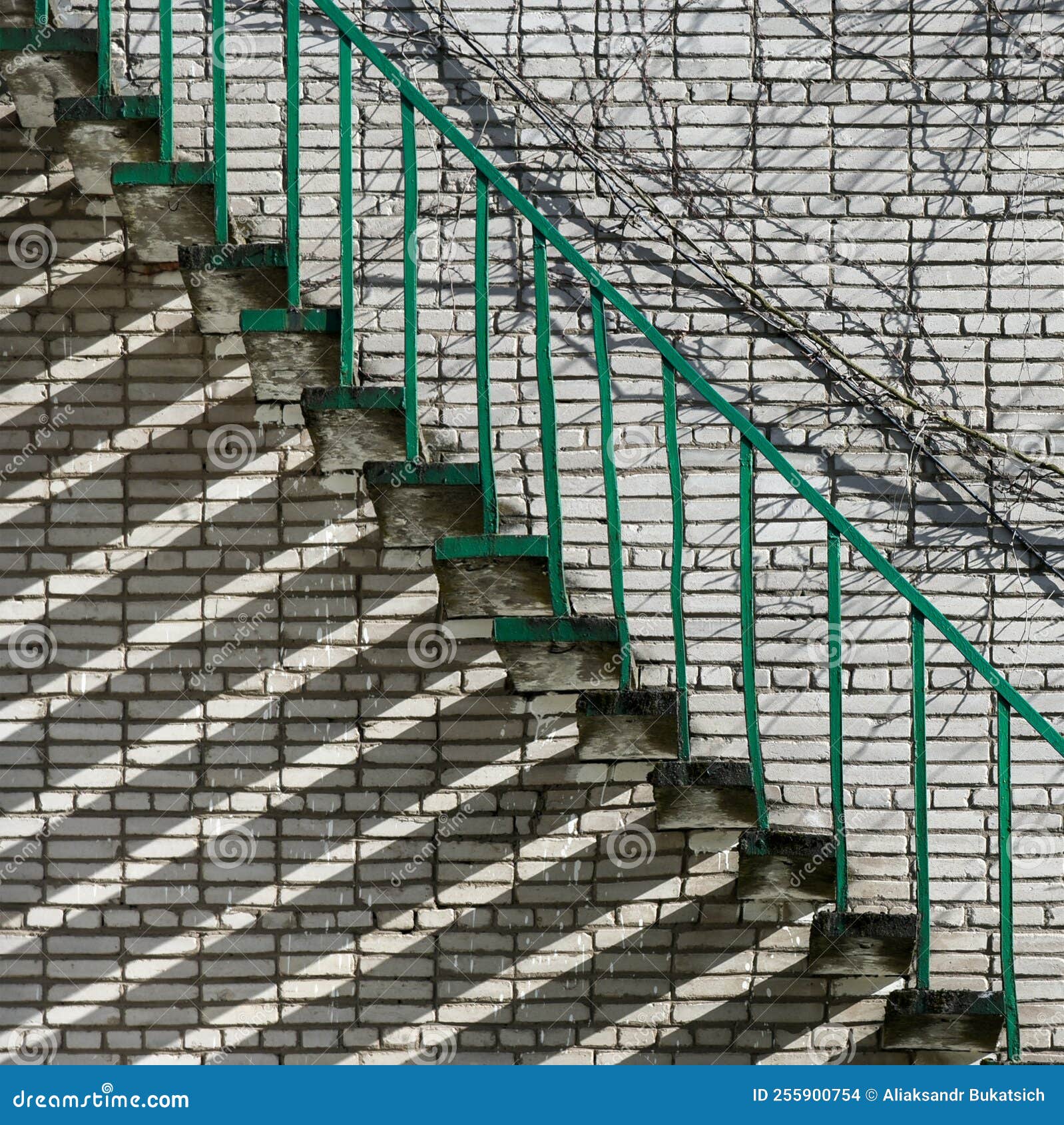 Iron Stairs Along a Brick Wall Stock Photo - Image of stairs, house ...