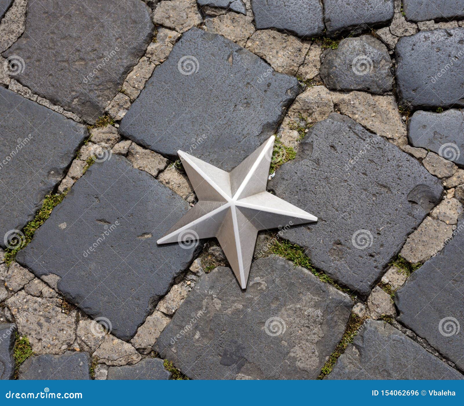 Iron star on the roadway stock photo. Image of iron - 154062696