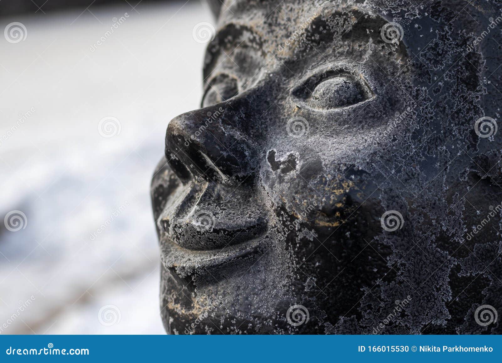 Iron statue of a male face stock photo. Image of irony - 166015530