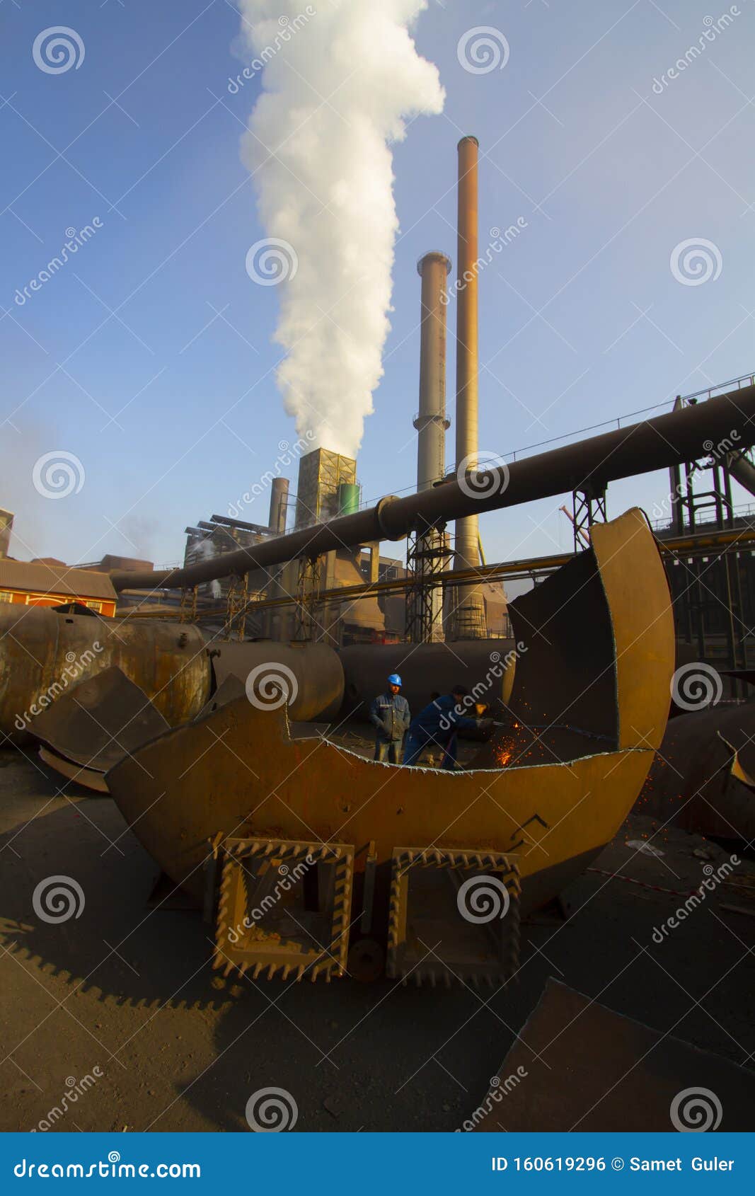 Iron and Steel Producing Factory and Workers Working. Editorial Photo ...
