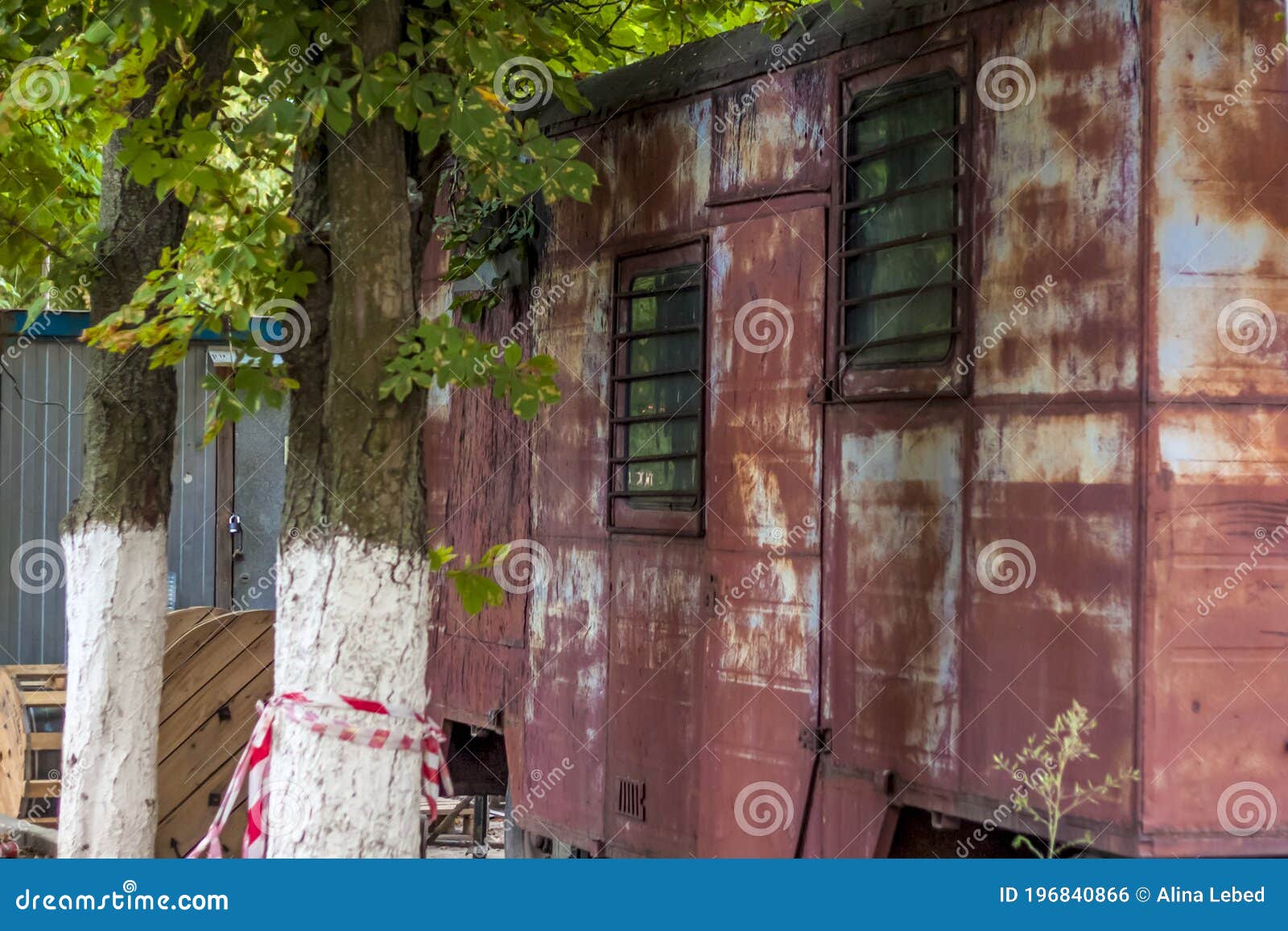 An Iron Van. a Rusty Trailer Stands among the Trees Stock Photo - Image ...