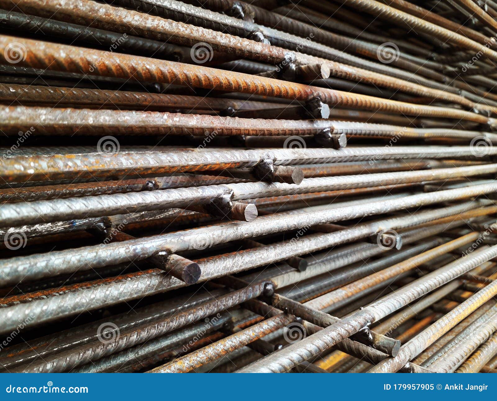 Iron Welding and Grinding Marks or Textures on Iron Pipes and Rods in a ...