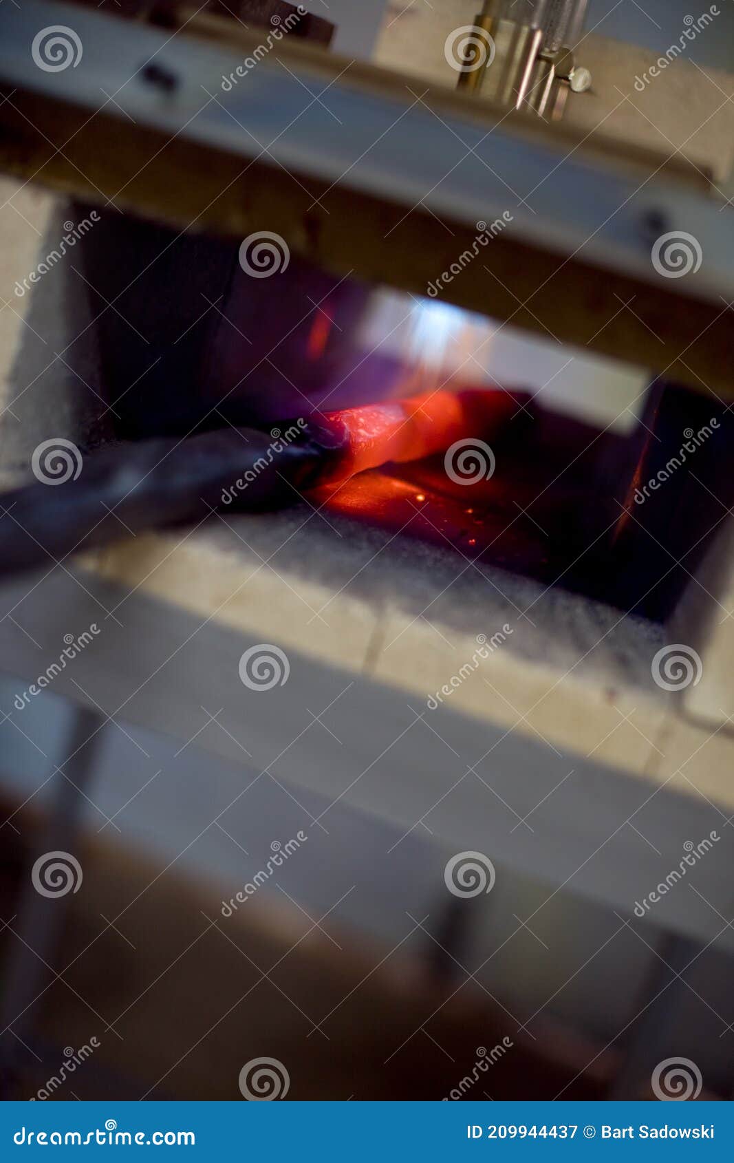 Hot Metal rod in a furnace stock image. Image of artisan - 209944437