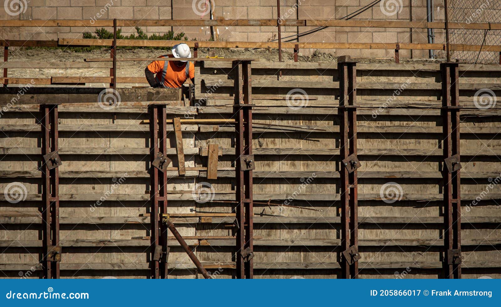 Iron Worker on Large Retaining Wall at a Construction Site Stock Image ...