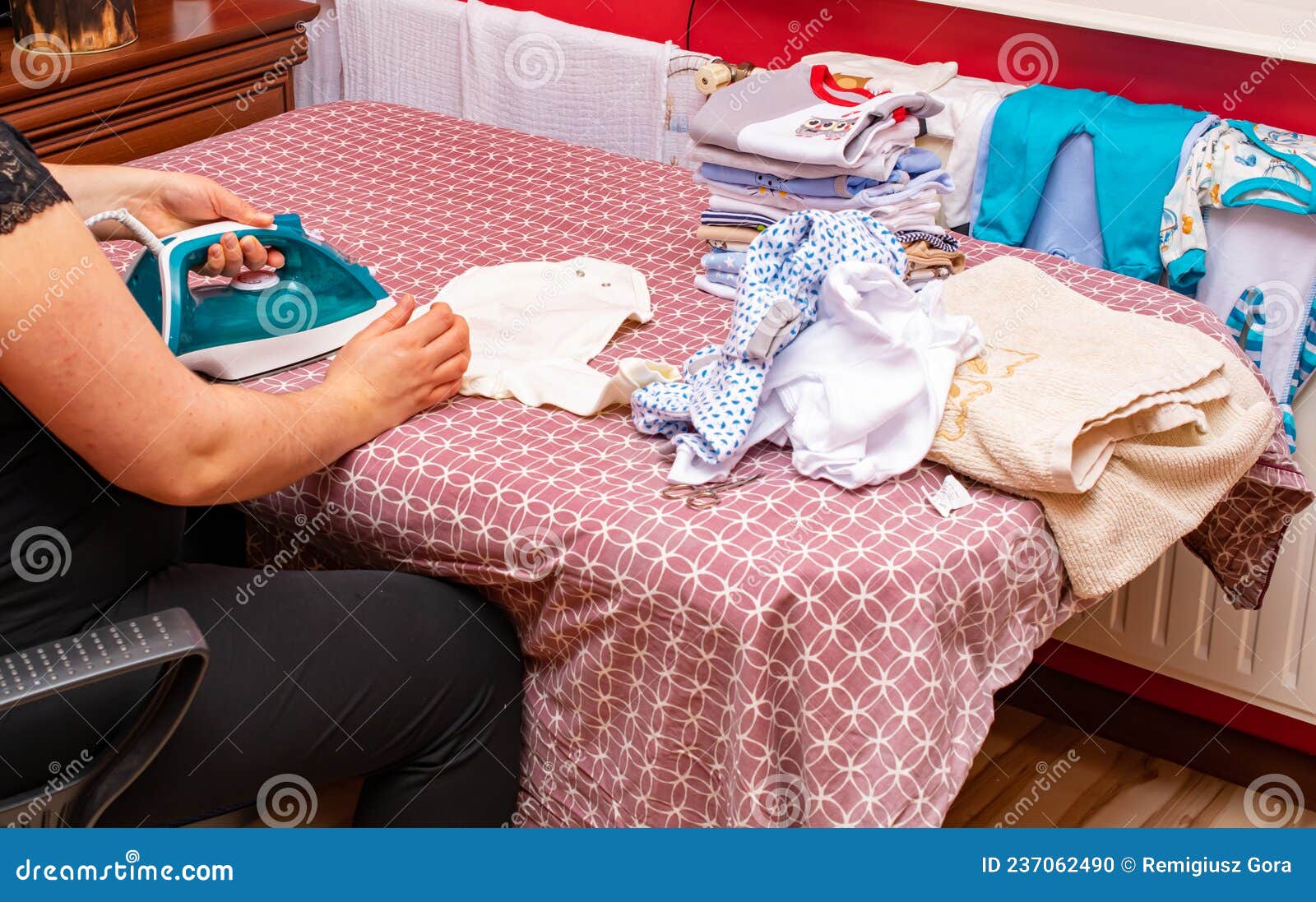 Ironing of Children S Clothes by Mom Stock Photo - Image of electrical ...