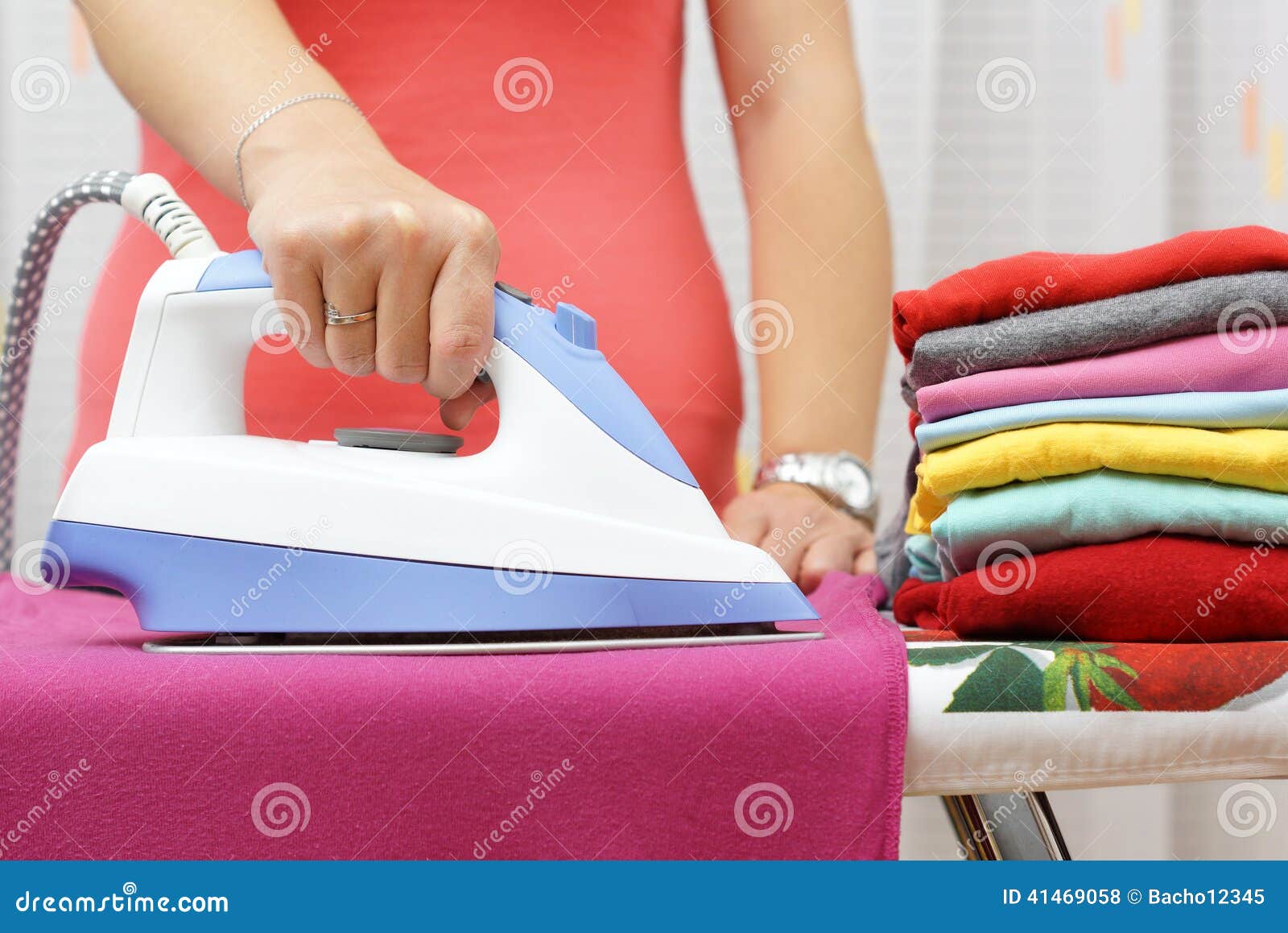 Ironing Clothes on Ironing Board Stock Photo - Image of electrical ...