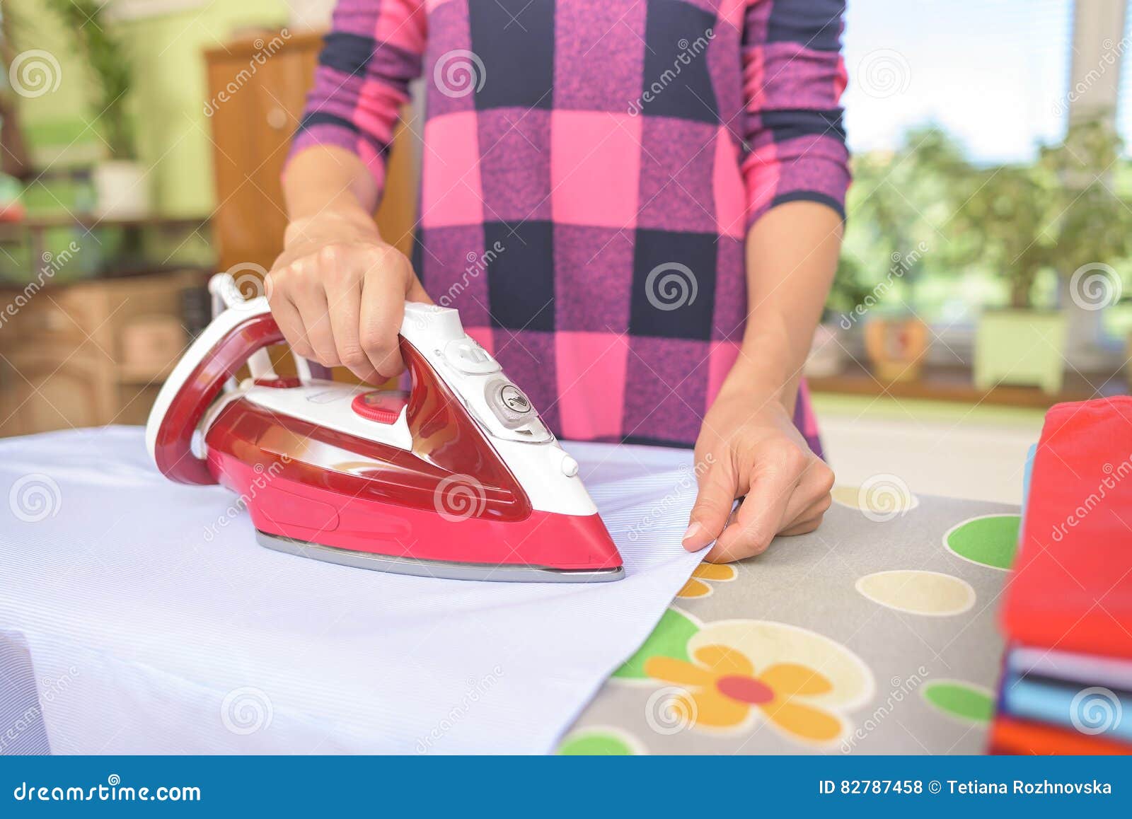 Ironing the clothes. stock photo. Image of home, cloth - 82787458