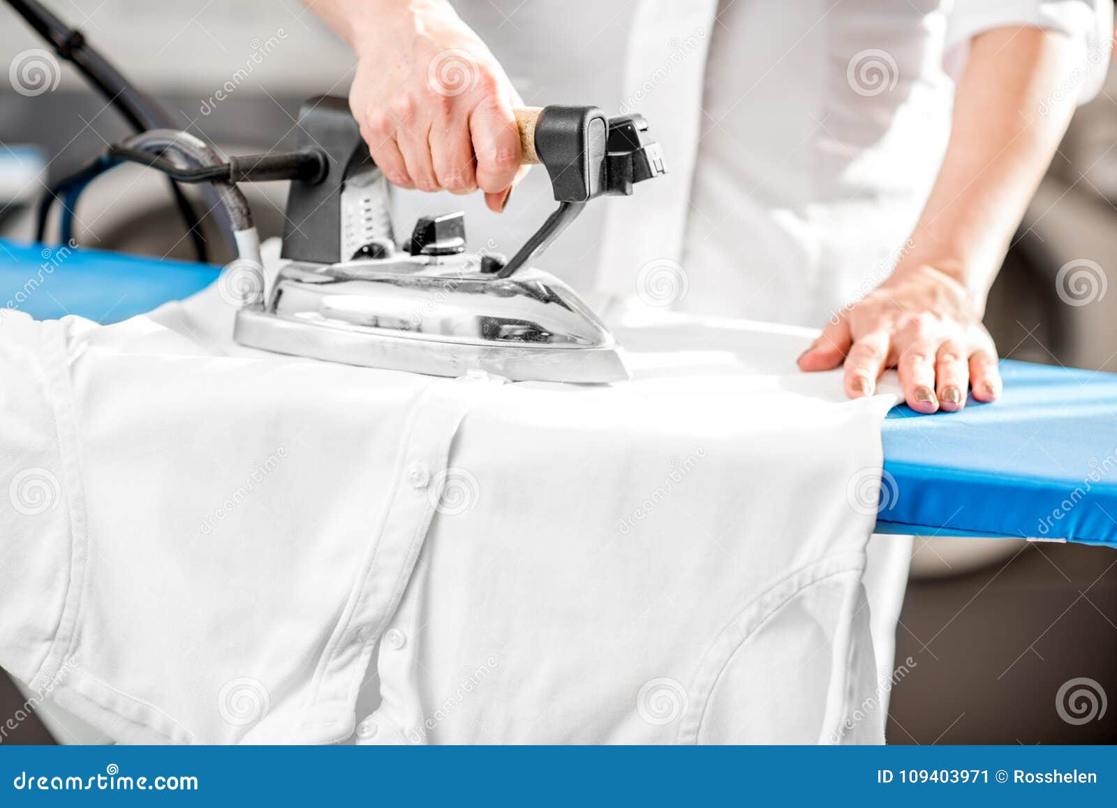 Professional Ironing in the Laundry Stock Image - Image of clothing ...