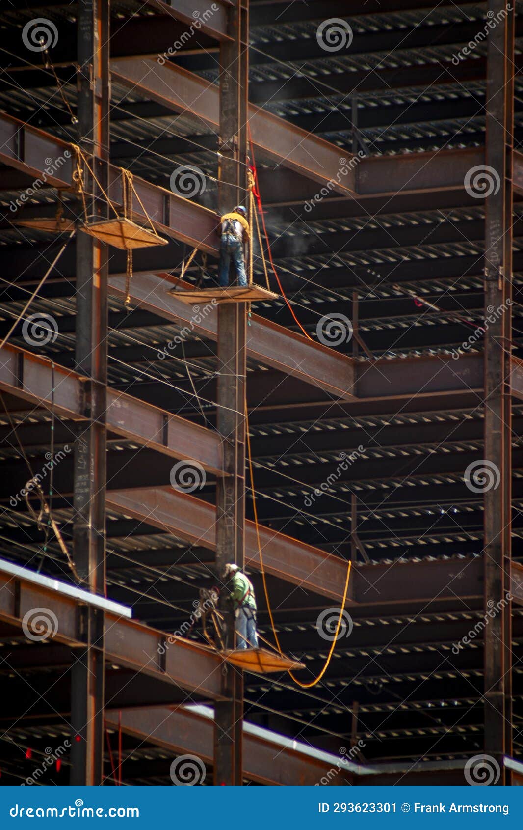 Ironworkers with Safety Lines Working on the Outside of Steel Framing ...
