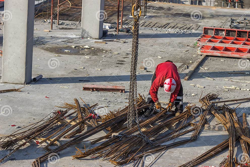 Ironworkers Unload and Position Reinforcing Steel Stock Photo - Image ...