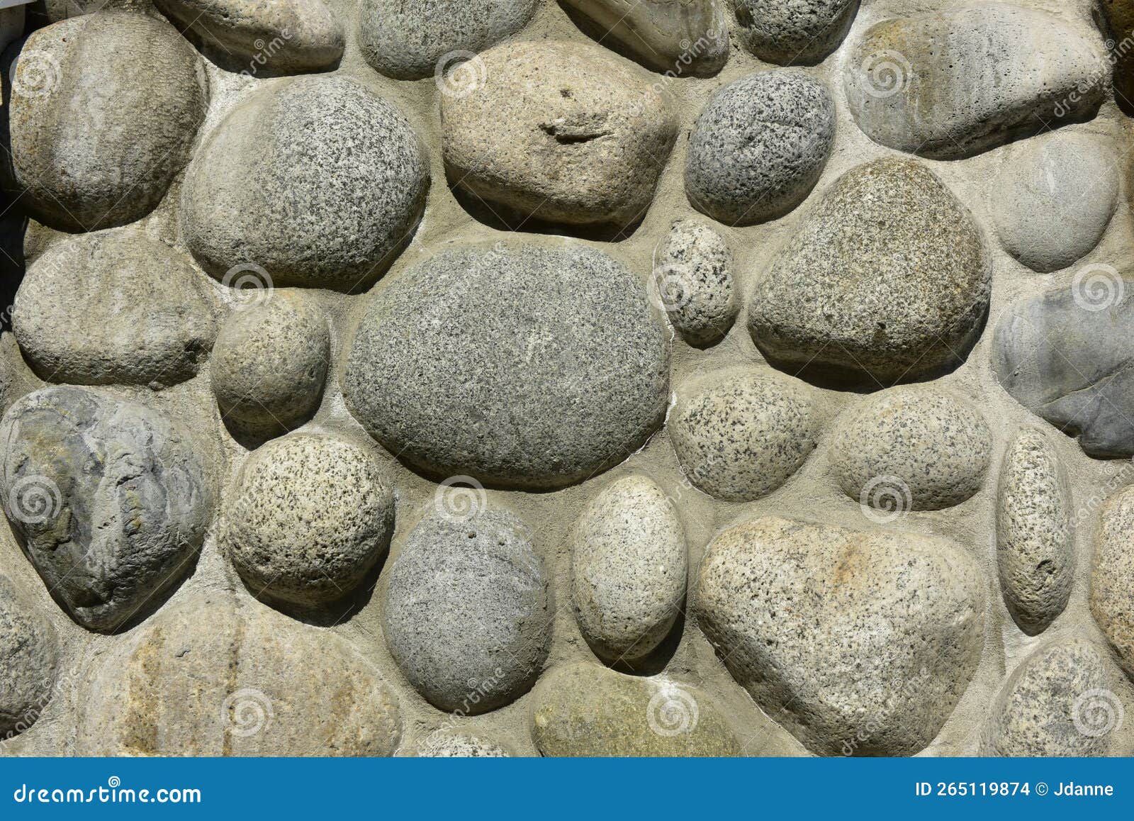 Irregular Brick Wall with Pebble Stones Stock Photo - Image of ...