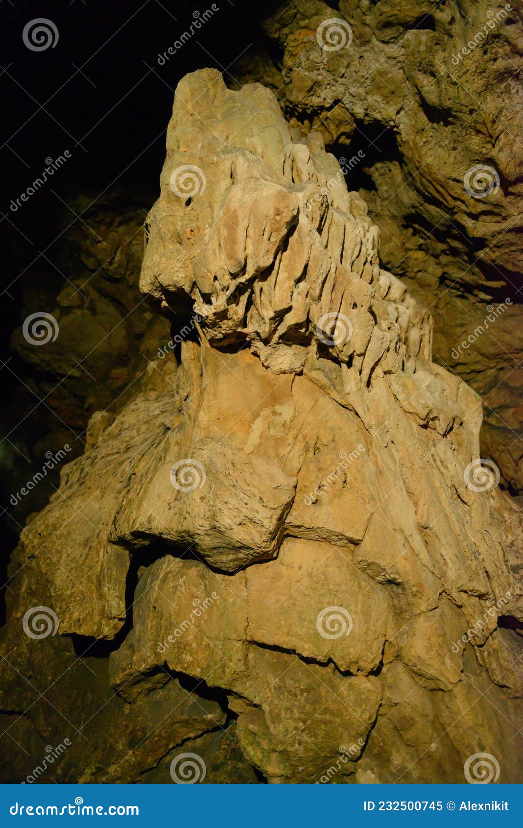 Irregular Stalagmite in a Dark Cave Stock Image - Image of sculpted ...